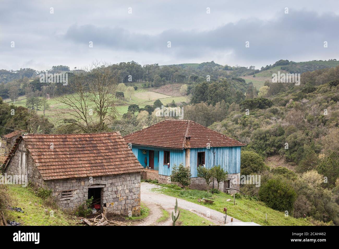 Old wooden and stone houses with brazilian rural background - Rio ...