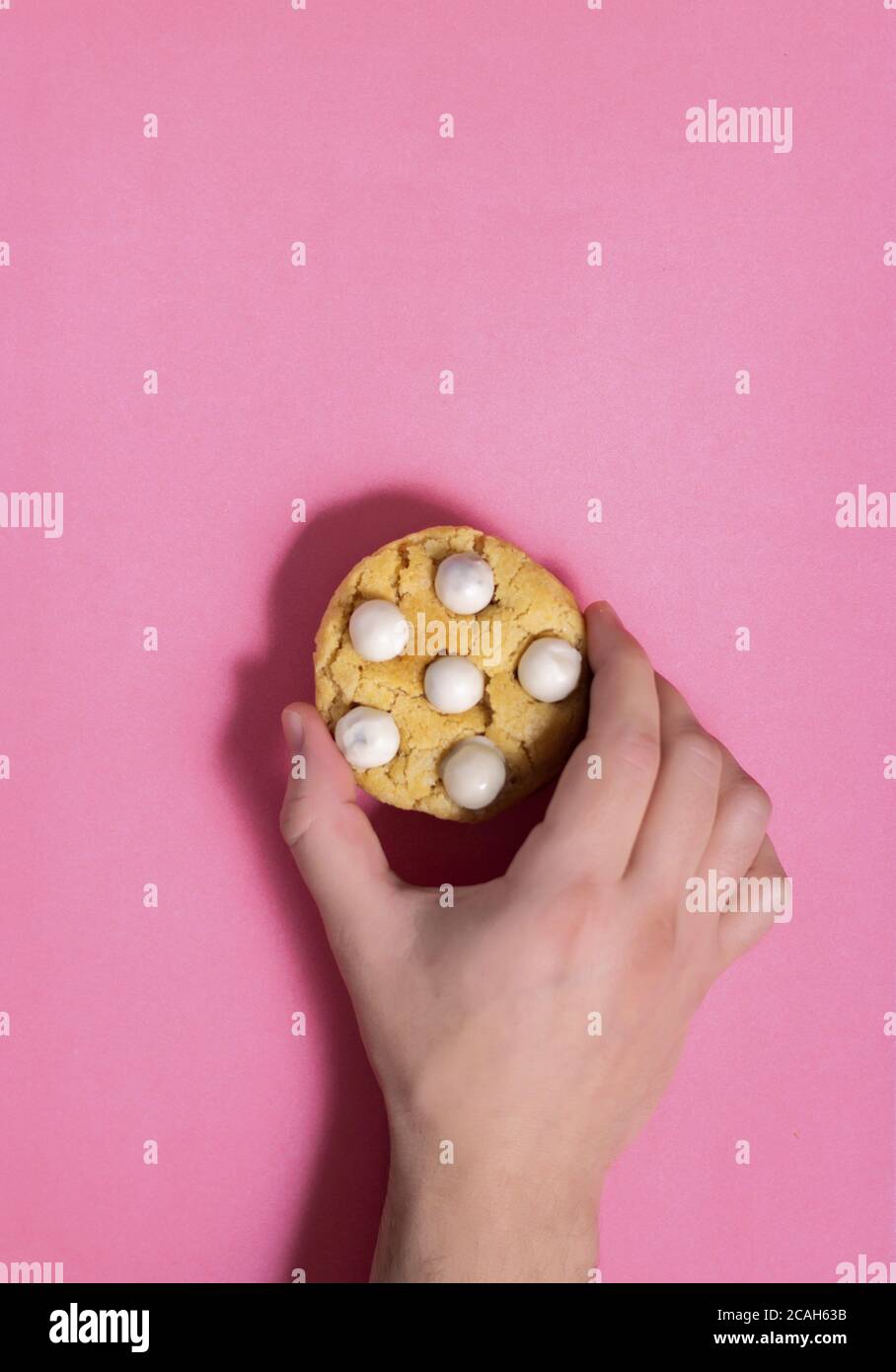 Top view of a person's hand holding the delicious and sweet chocolate ...