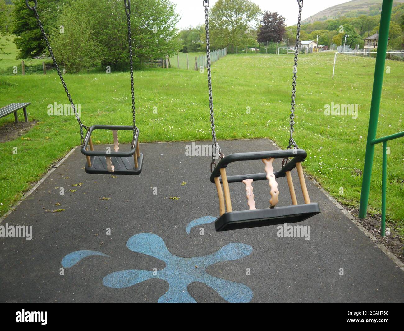 Child swings uk hi-res stock photography and images - Alamy