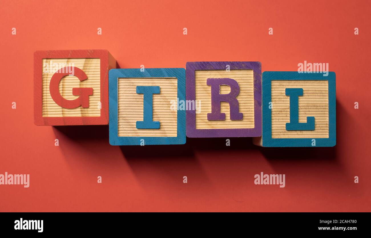 Word Girl written with wooden colored cubes Stock Photo - Alamy