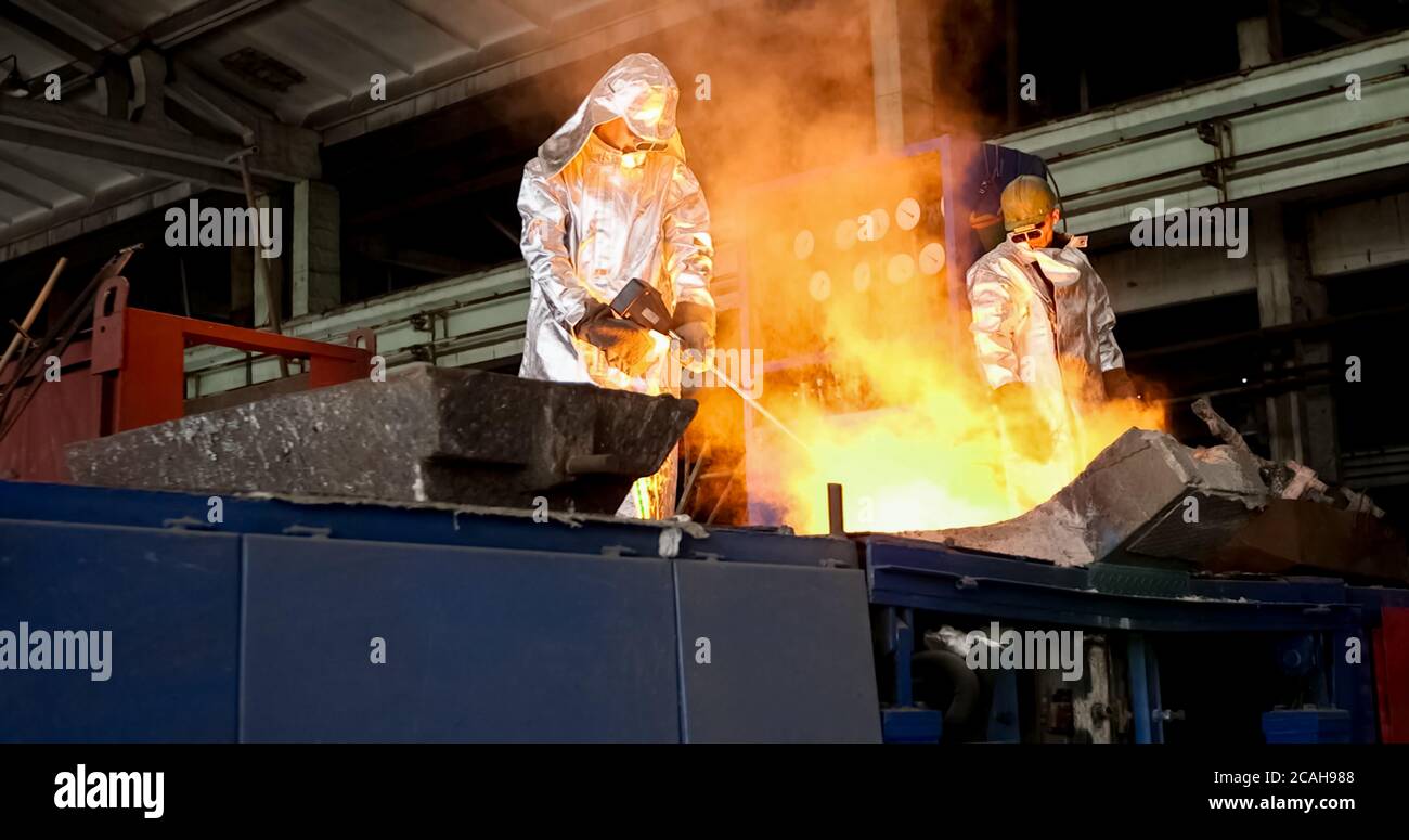 red-hot molten steel in a iron and steel enterprise production scene ...
