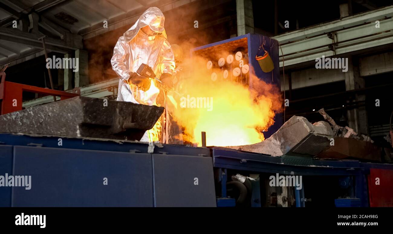 red-hot molten steel in a iron and steel enterprise production scene ...