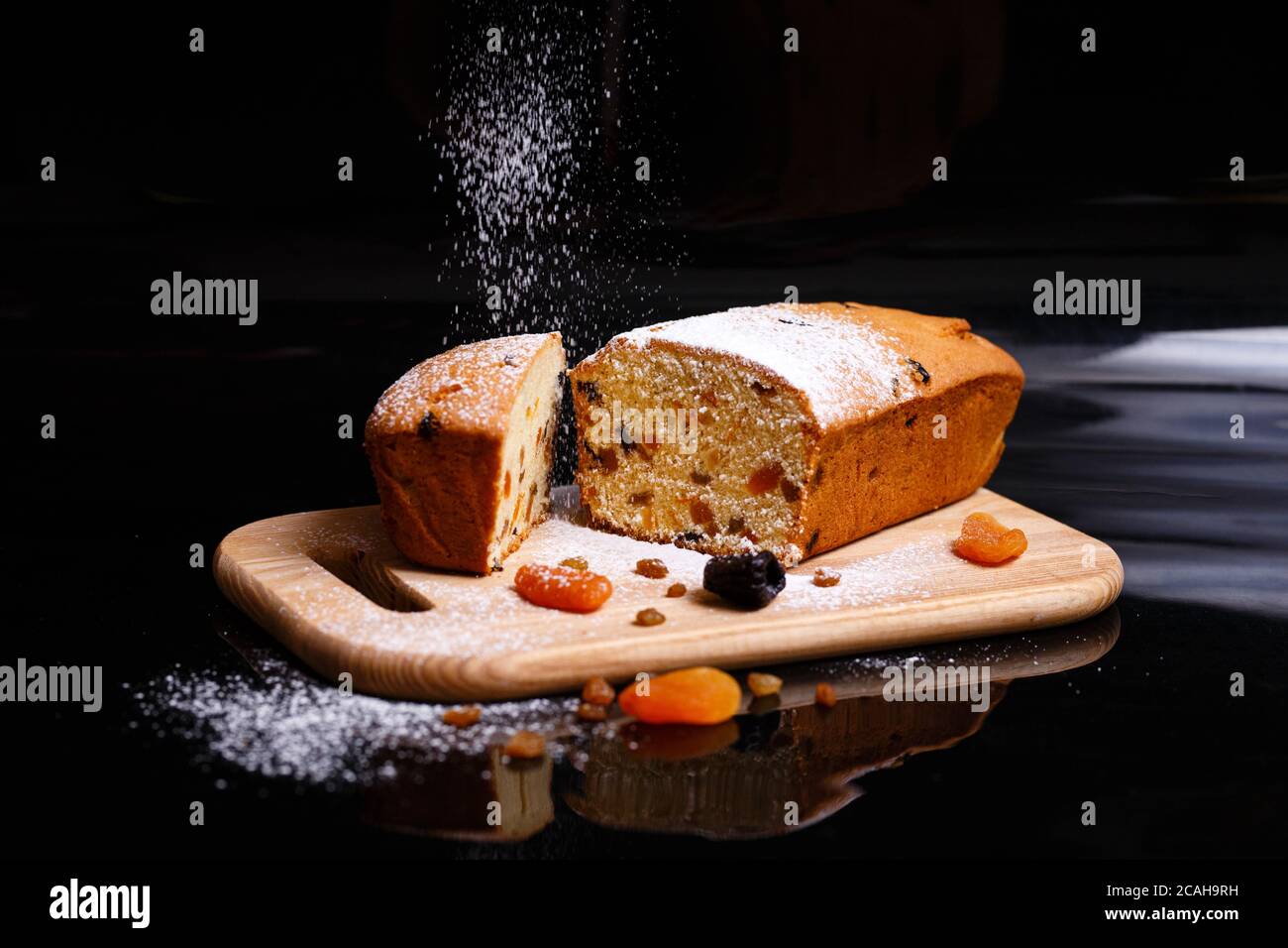 Sweet cupcake in the shape of bread. Cupcake with raisins, dried ...