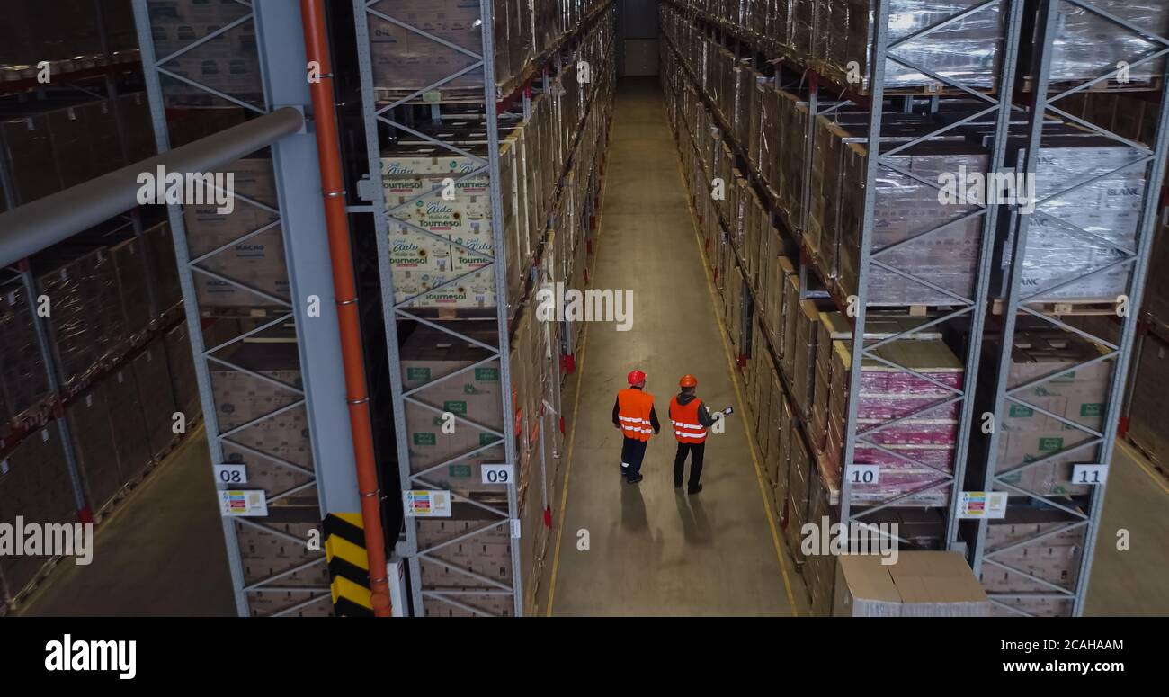 Mobile Aisle Racking System in Distribution Warehouse Stock Photo - Alamy
