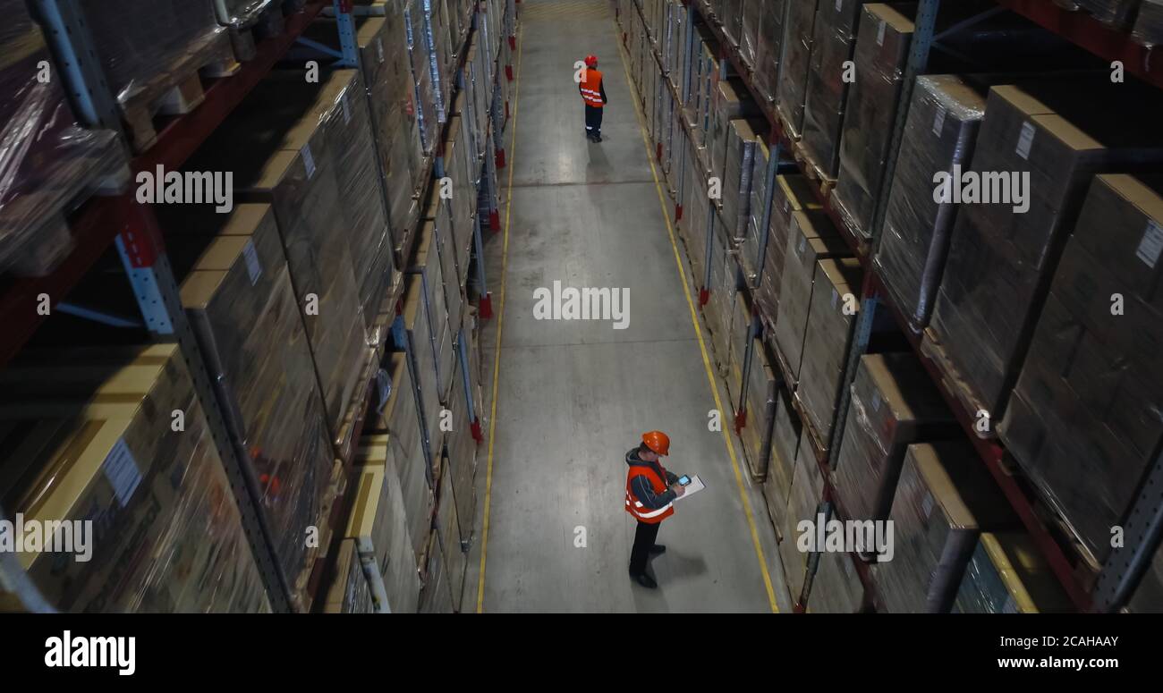 Mobile Aisle Racking System in Distribution Warehouse Stock Photo - Alamy