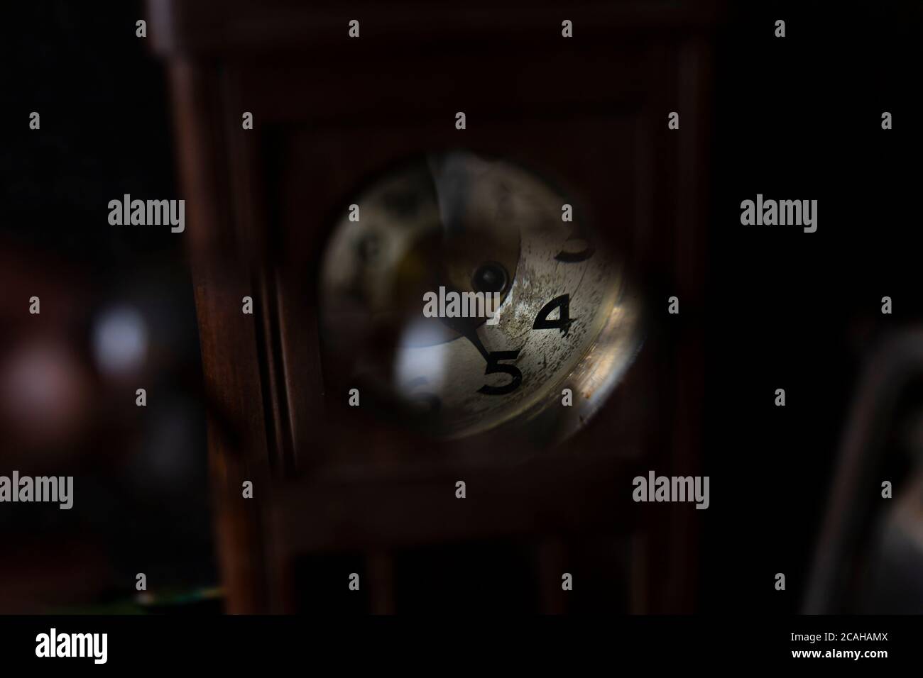 Clock through books hi-res stock photography and images - Alamy