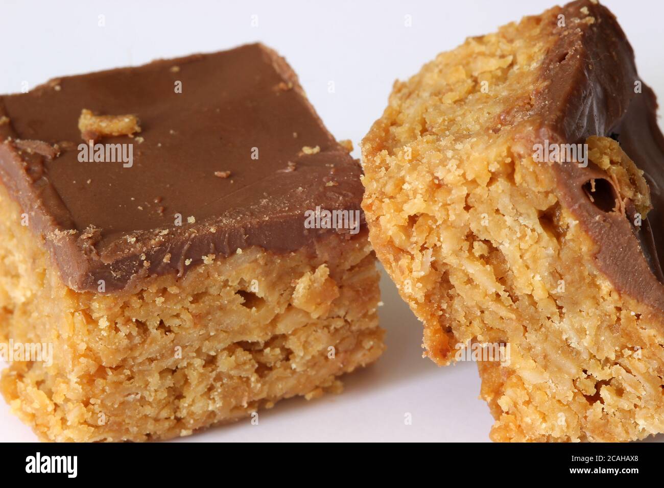 Chocolate covered flapjack pictured close up Stock Photo - Alamy