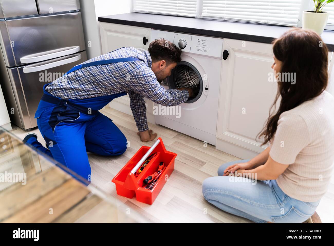 Washing Machine Appliance Problem Repair By Technician Stock Photo - Alamy