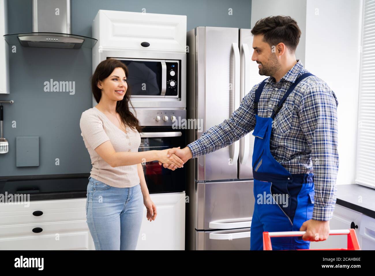 Man woman hand shake hi-res stock photography and images - Alamy