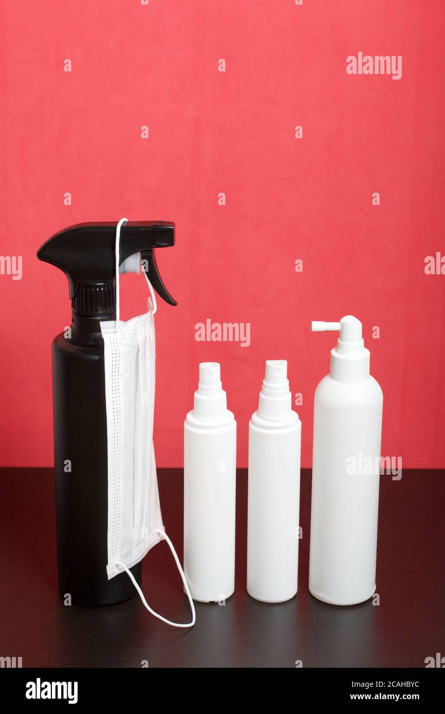 Sprayers with antiseptic, black and white. For surface treatment ...