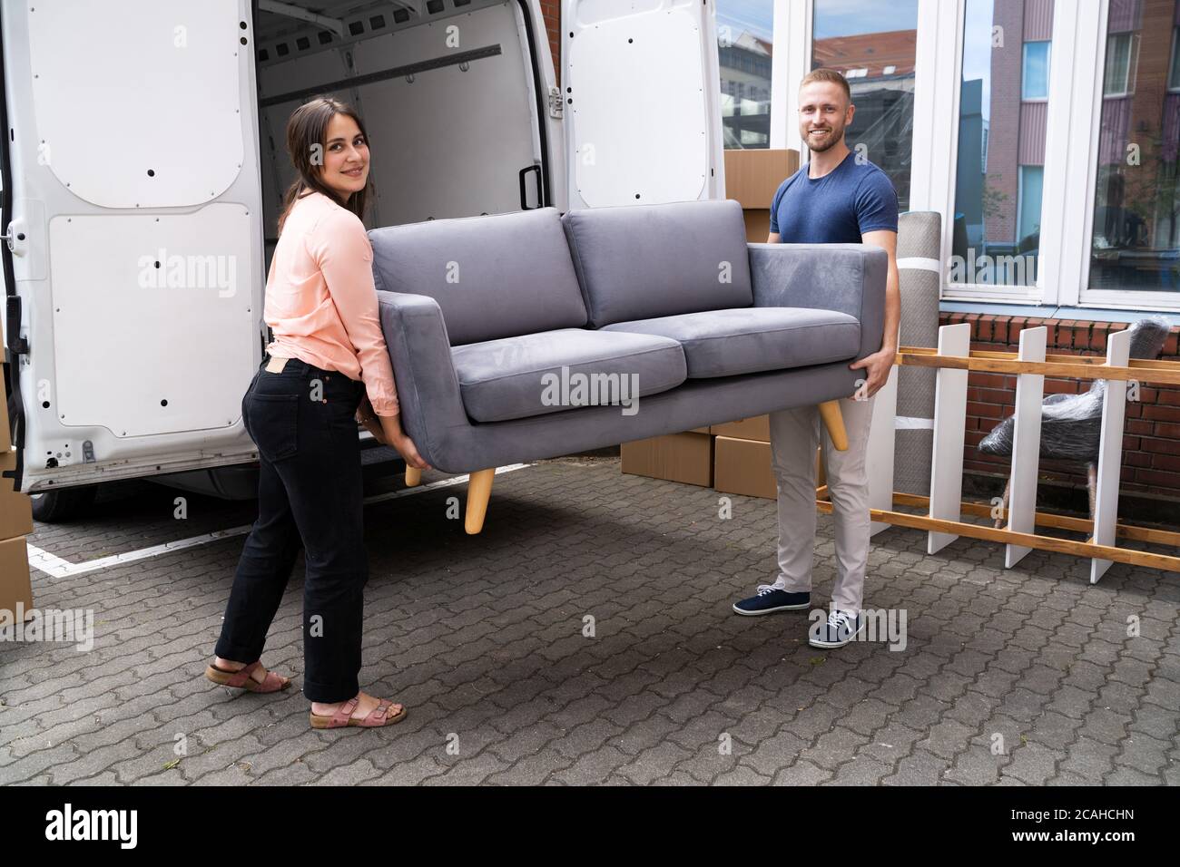 People moving couch hi-res stock photography and images - Alamy