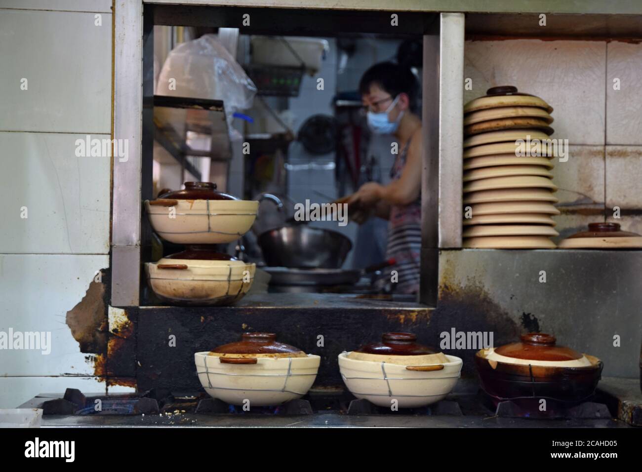 The clay pots in China are used for a popular Cantonese-style dish ...
