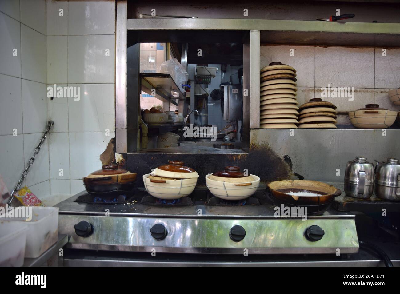 The clay pots in China are used for a popular Cantonese-style dish ...