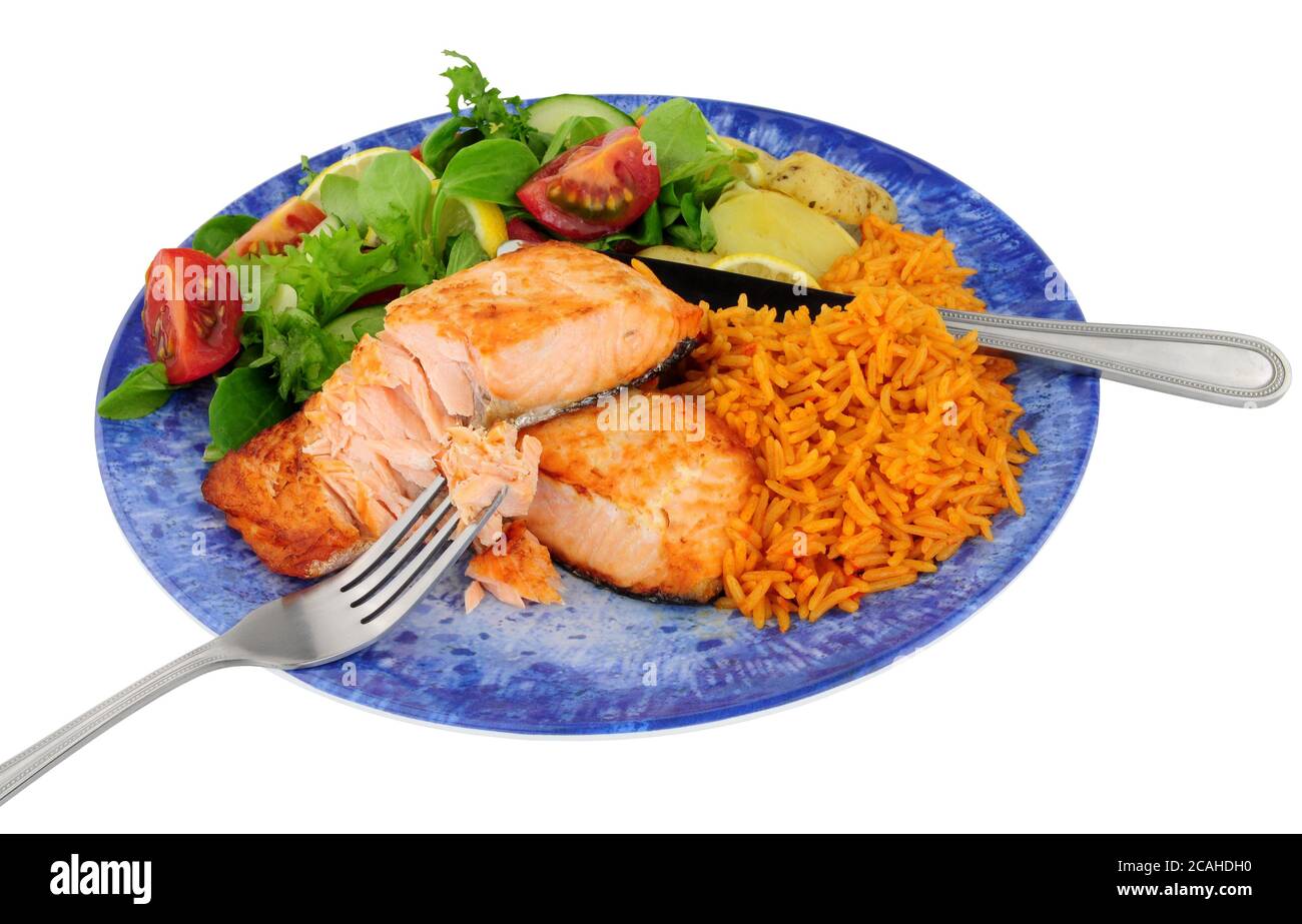 Grilled salmon fish fillets with chilli flavoured rice and salad meal ...
