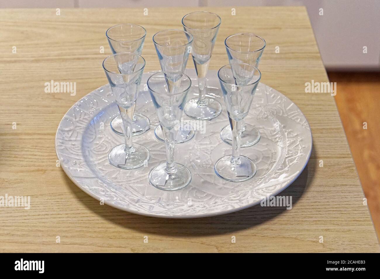 Six shot spirit drinks glasses at tray Stock Photo - Alamy