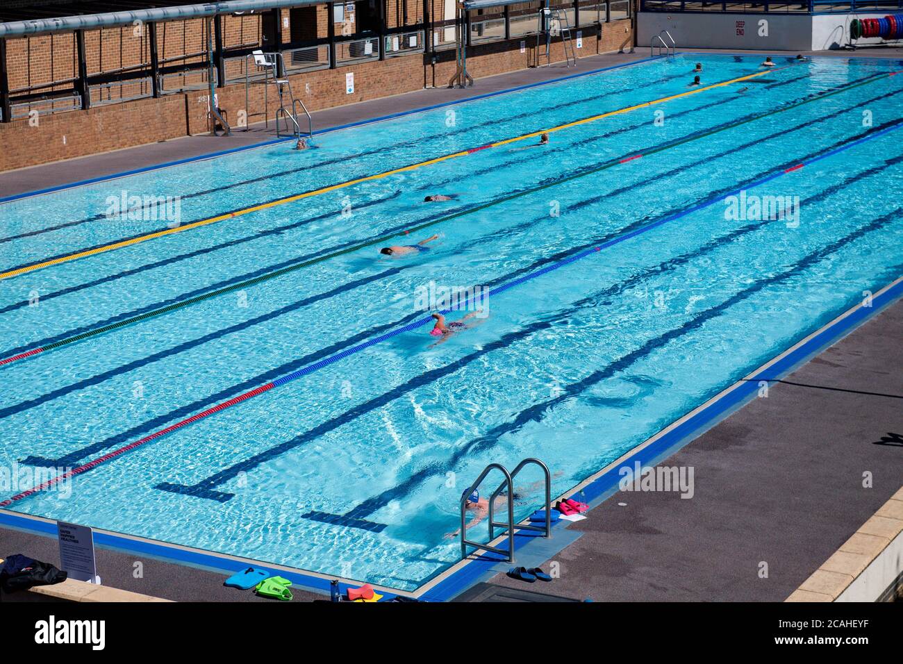 Swimmers enjoy the pool at Woodgreen Leisure Centre, Oxfordshire, as ...