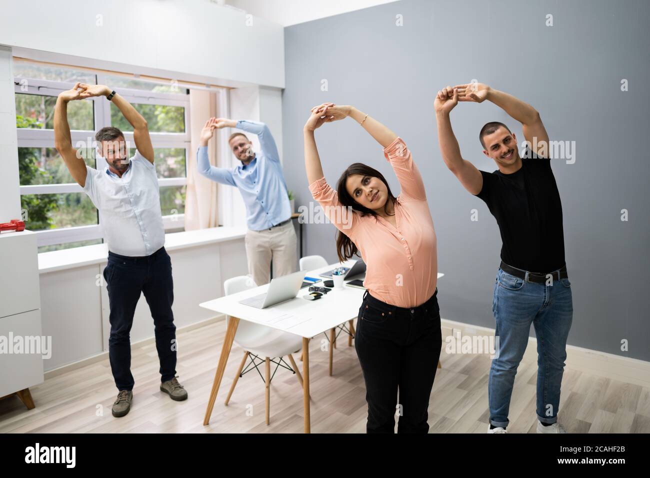 Group standing exercise hi-res stock photography and images - Alamy