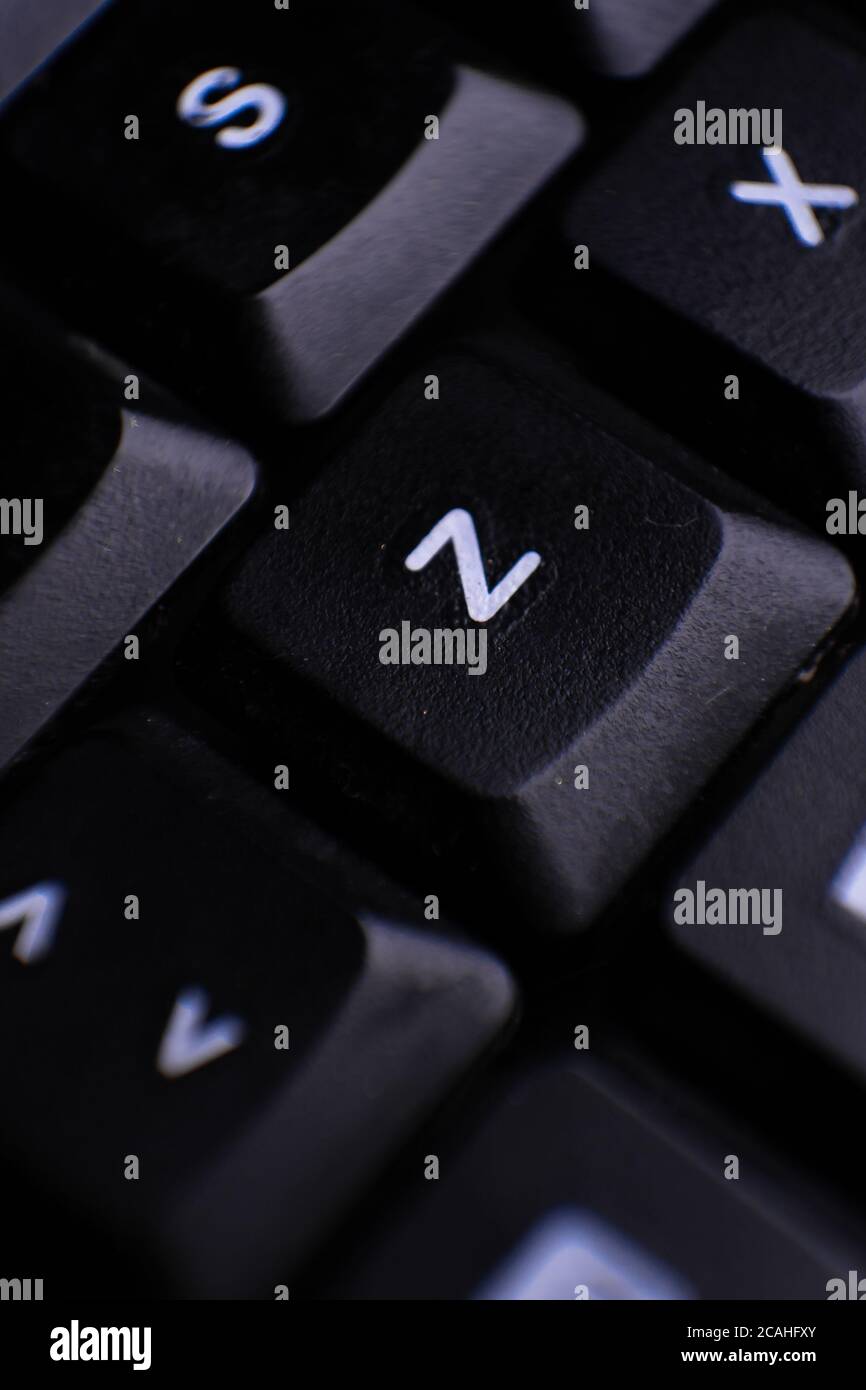 Vertical closeup shot of keyboard pointing letter Z Stock Photo - Alamy