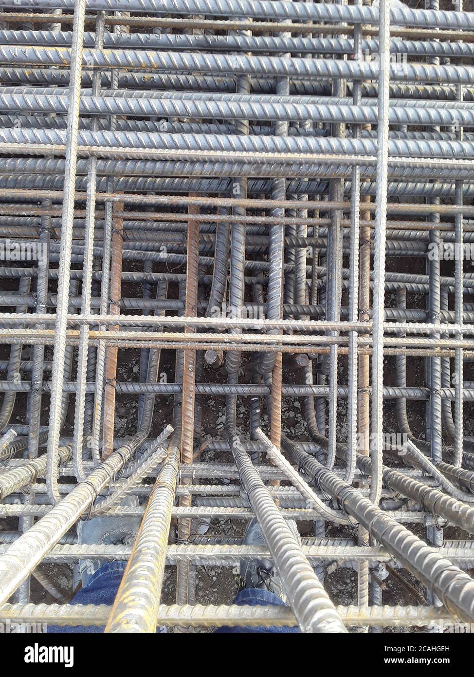 Vertical shot of metal reinforcement frame Stock Photo - Alamy