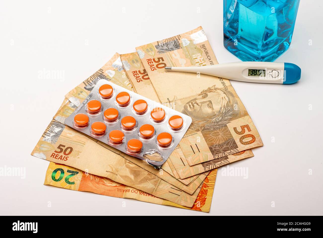 medicine tablet, thermometer indicating 38.9 degrees and Brazilian ...
