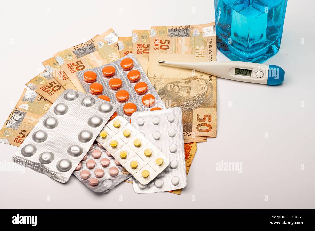 medicine tablet, thermometer indicating 38.9 degrees and Brazilian ...