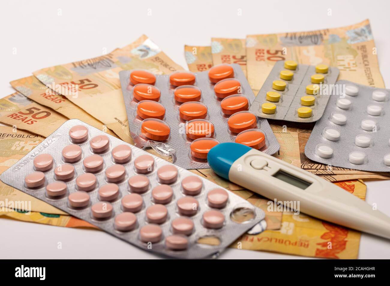 medicine tablet, thermometer indicating 38.9 degrees and Brazilian ...