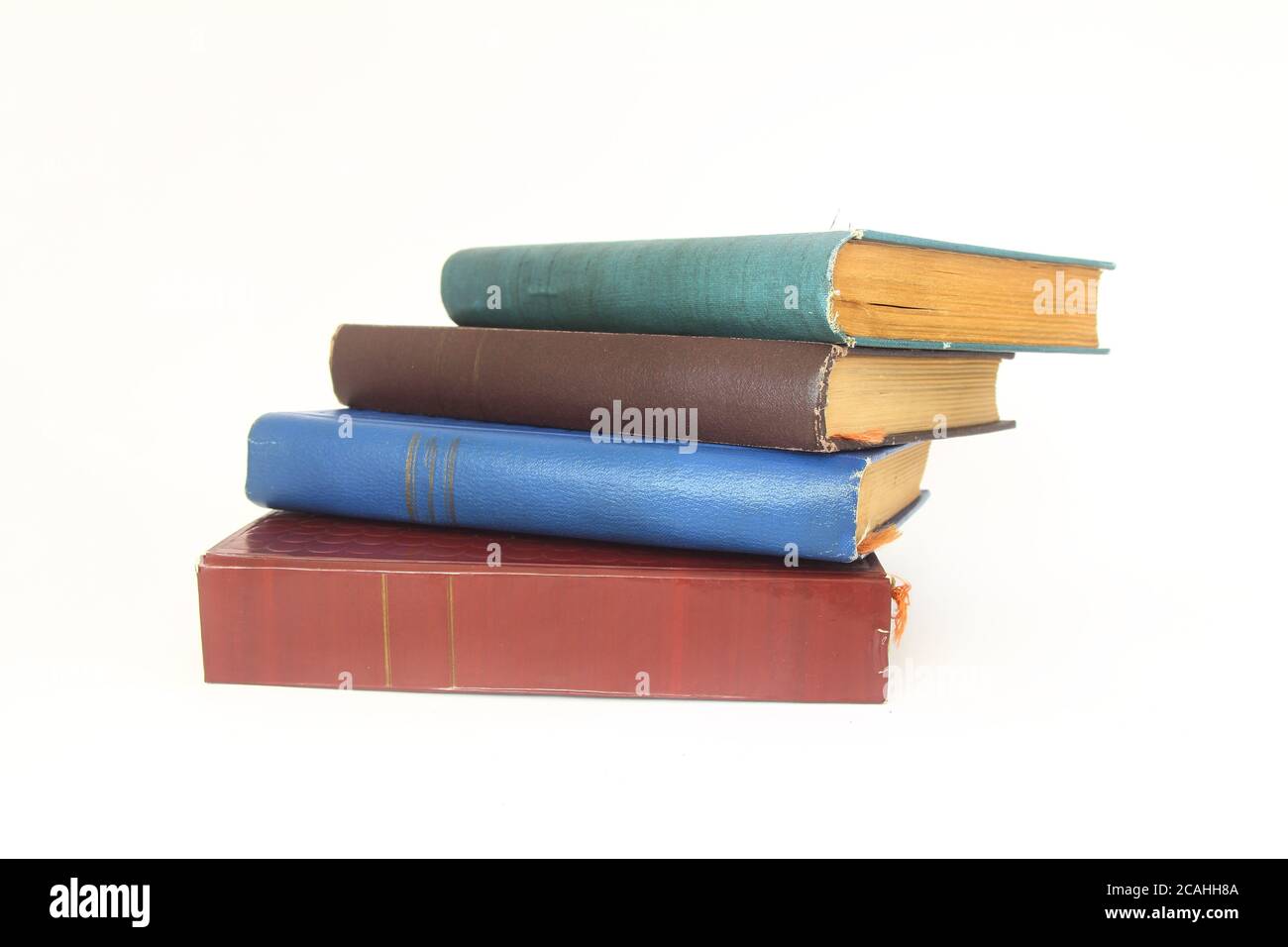 Stack of books in a library Cut Out Stock Images & Pictures - Alamy