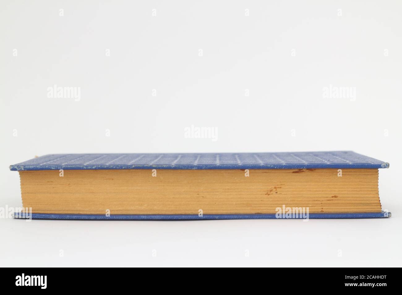 stack of blue books isolated on white Stock Photo - Alamy