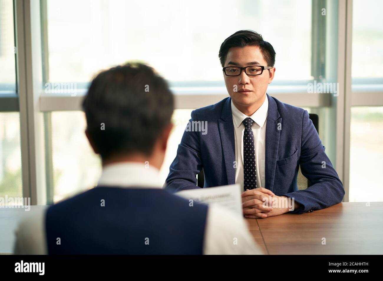 Nervous man looking interviewer hi-res stock photography and images - Alamy