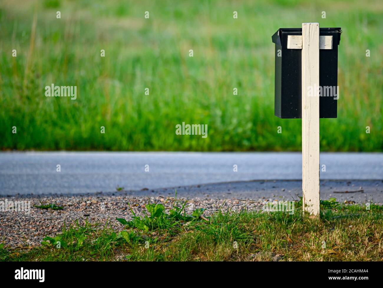 metal mailbox on white wooden cross near road Stock Photo - Alamy