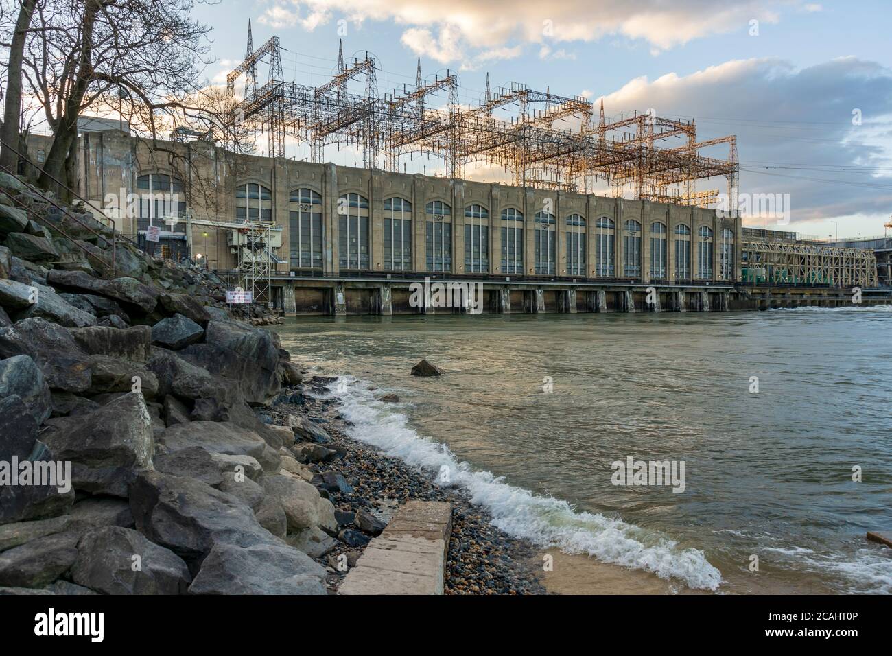 The sun is setting over the Conowingo Dam, which crosses the ...