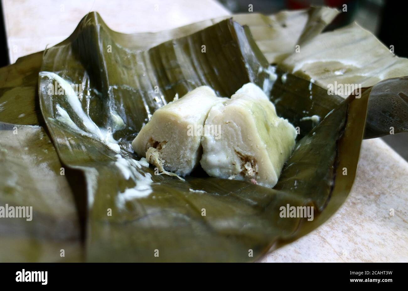 Mentho. Made from rice flour filled with chicken or beef. Wrapped in ...
