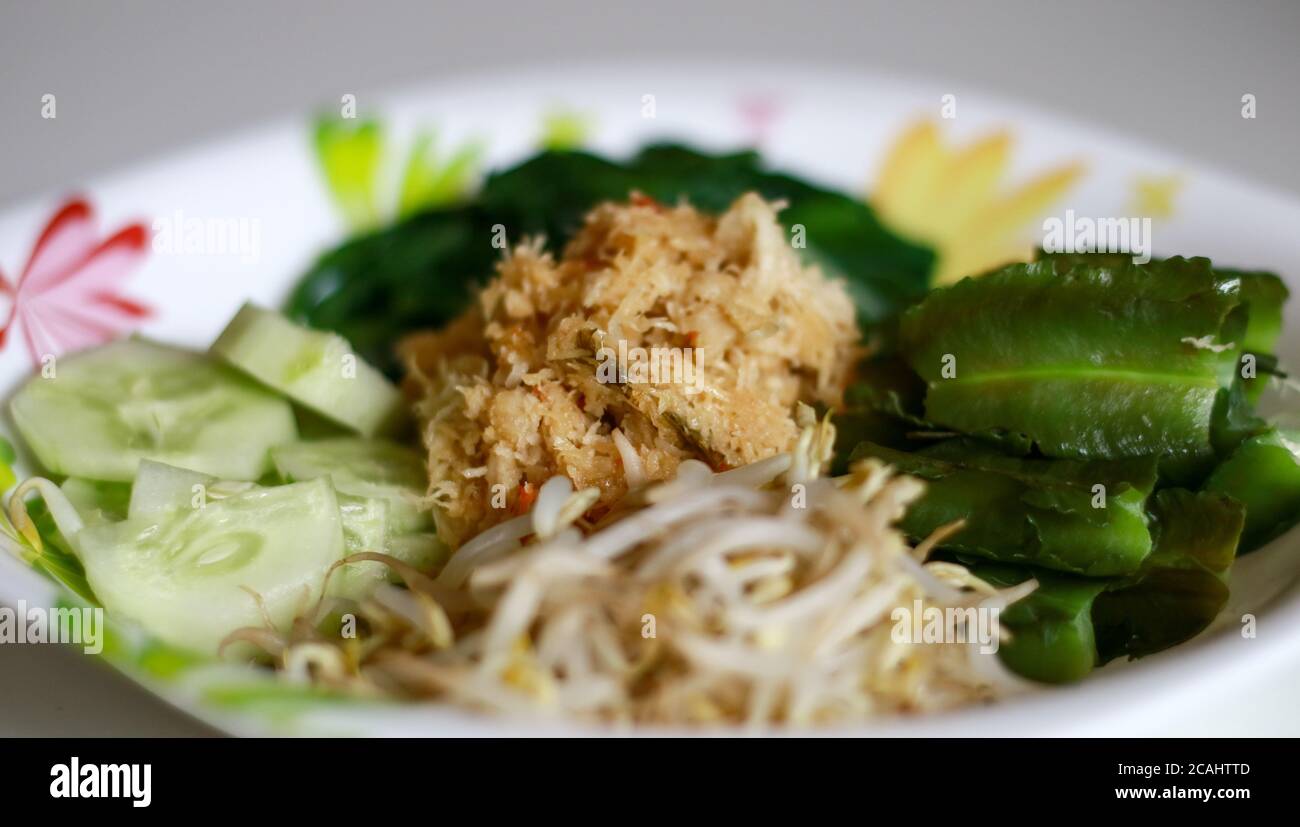 Sayur urap. Cooked vegetables with spiced grated coconut. Indonesian ...