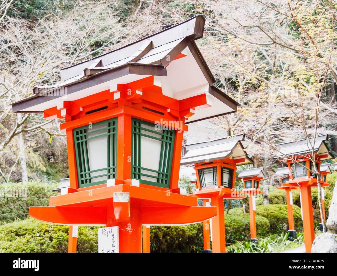 Closeup shot of red light poles continued staircase entrance Kibune ...