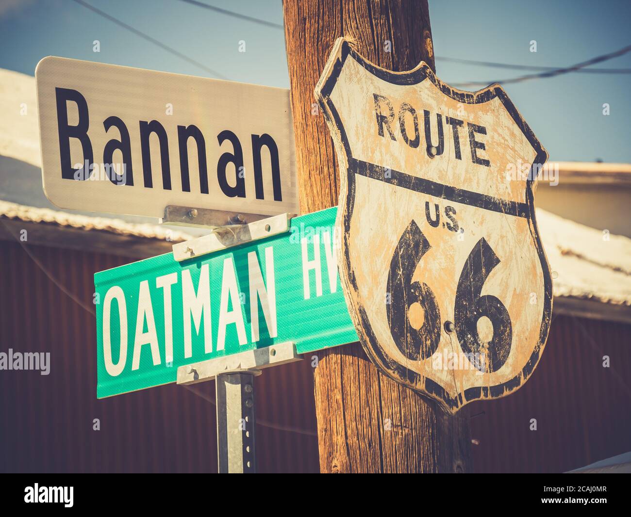 Closeup of an road signs and markers near a wooden electric post Stock ...