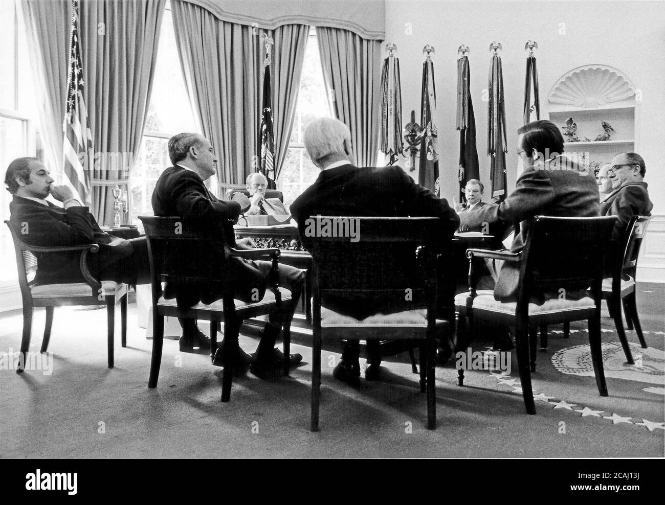 In this file photo, Extra chairs were pulled into the Oval Office in ...