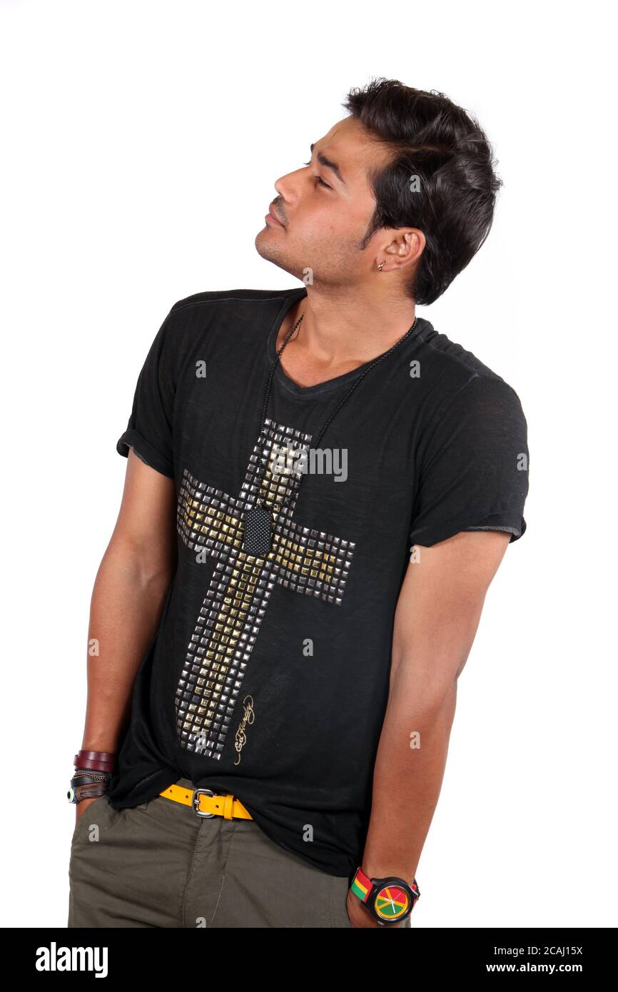 A guy looking behind on a white studio background. The background can ...