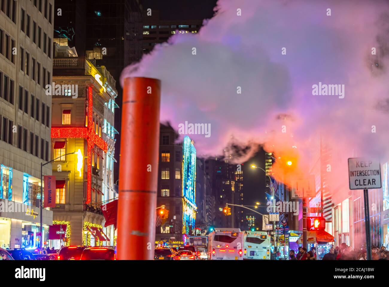 The steam rises and drifts Among the Midtown Manhattan 5th Avenue Stock ...