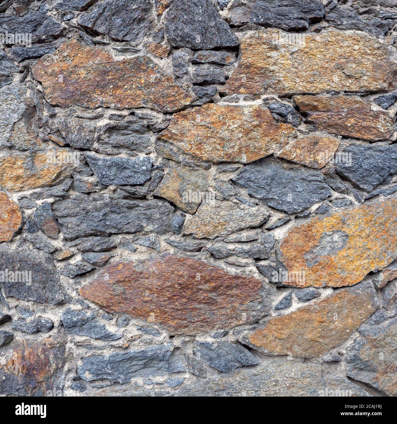 Details of the natural old stonewall, usable for the background or ...