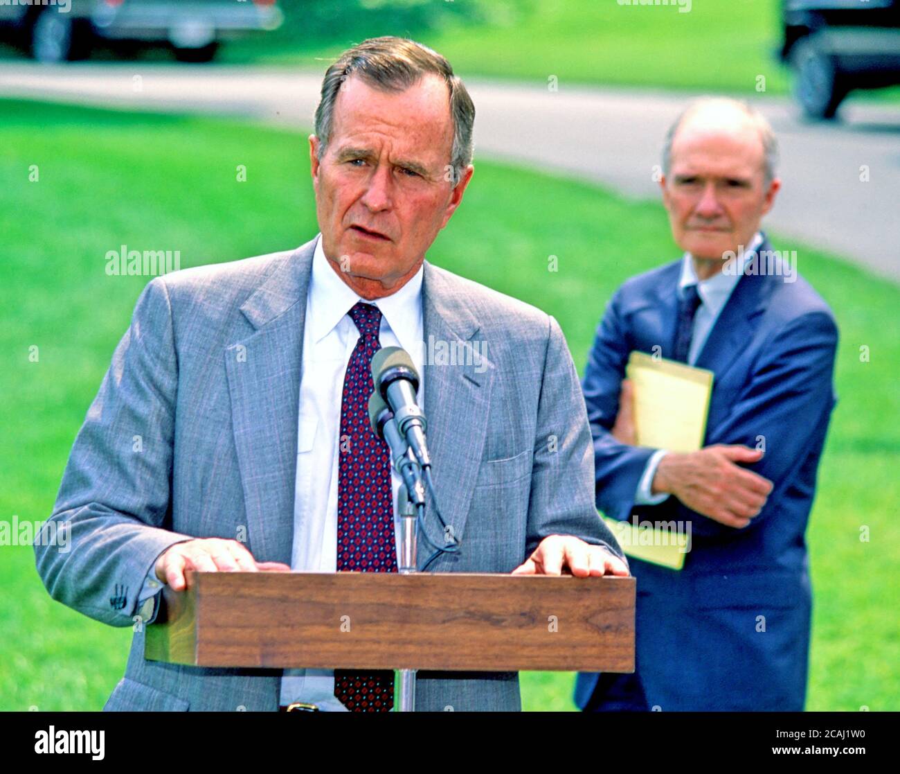 In this file photo, United States President George H.W. Bush speaks to ...