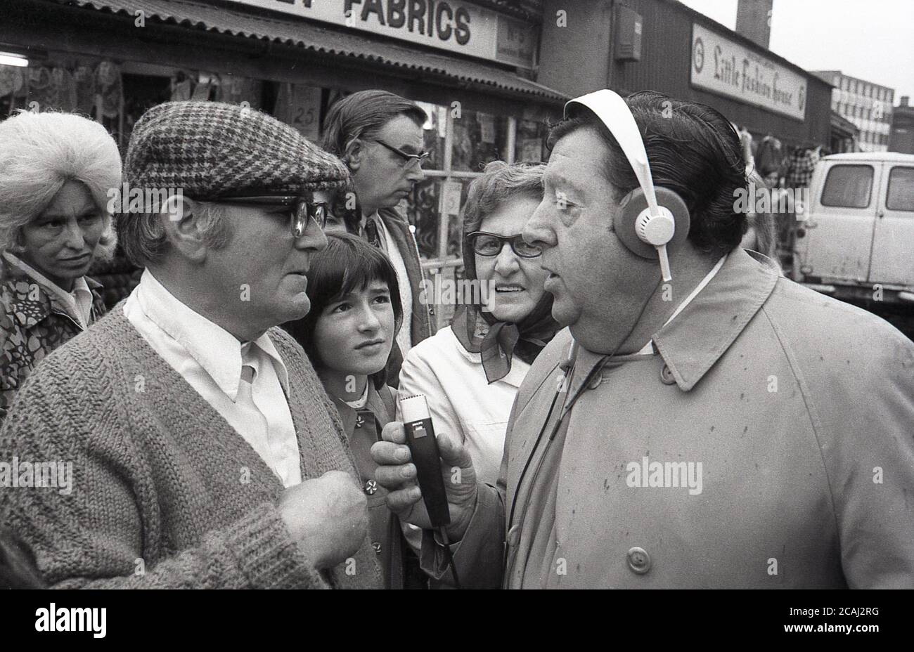 During an interview with a reporter hi-res stock photography and images ...