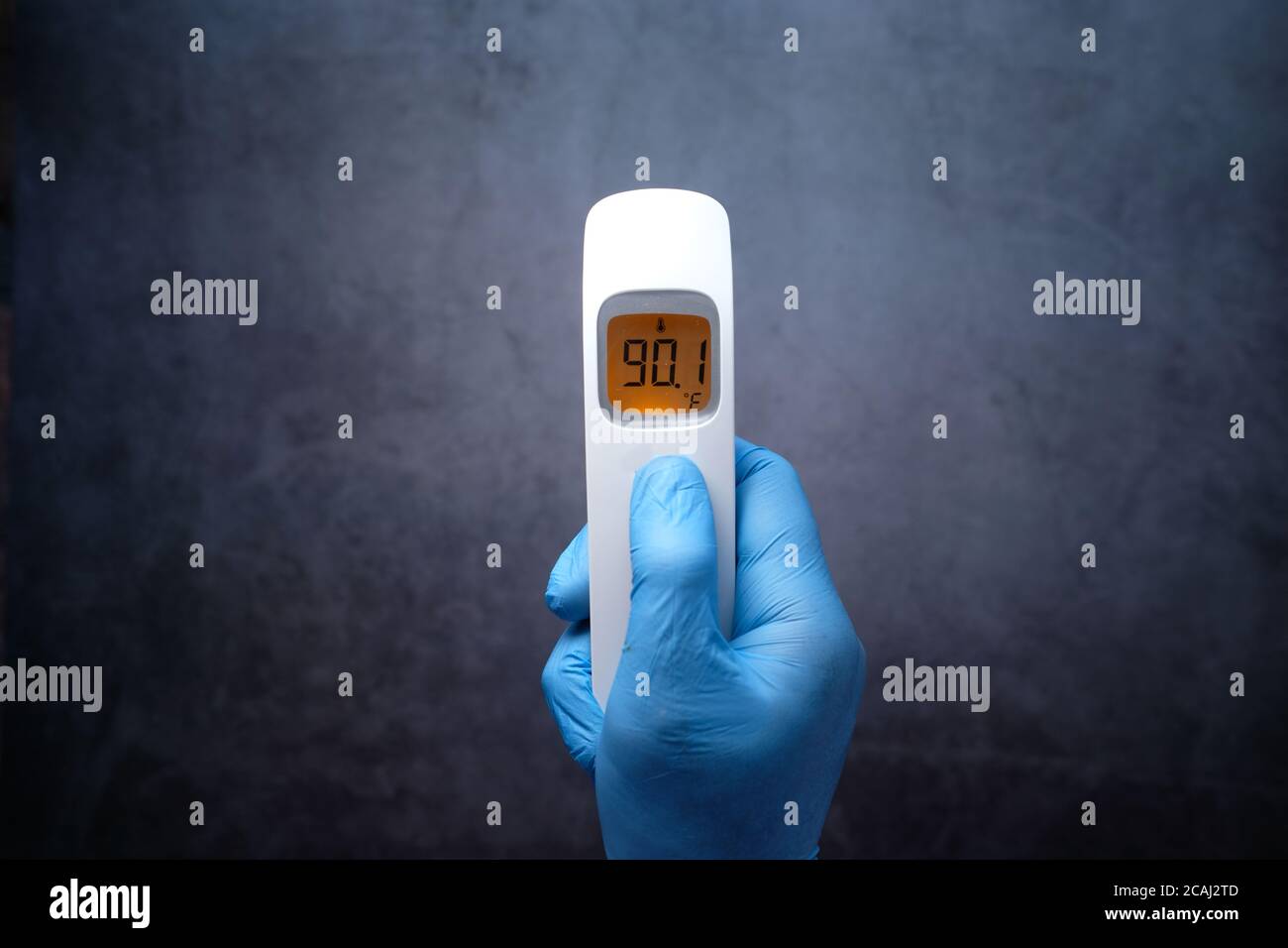 Doctor hand thermometer check hi-res stock photography and images - Alamy