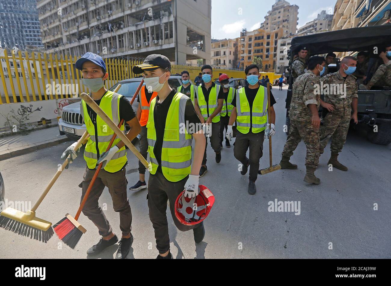 Beirut, Lebanon. 7th Aug, 2020. Volunteers help to clean the streets in ...