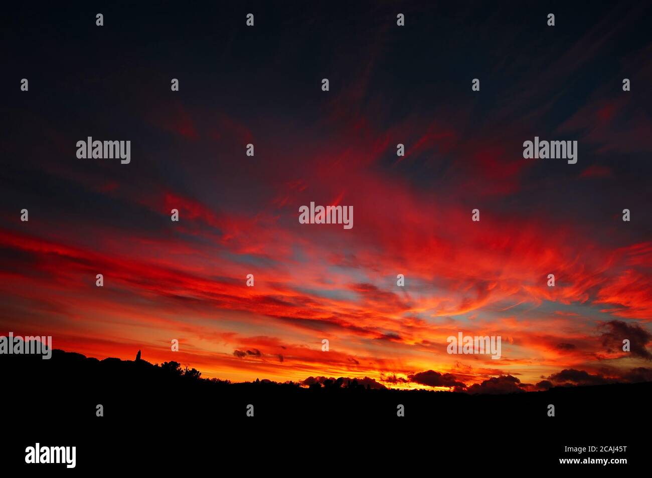 Beautiful fiery red sunset Stock Photo - Alamy