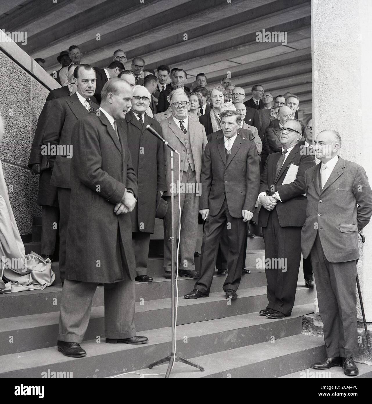 1965, historical, Opening of a new building, at a microphone, a man ...