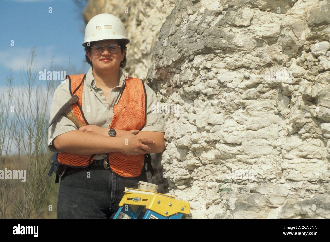 Austin Texas USA: Hispanic female geologist working on road cut in ...
