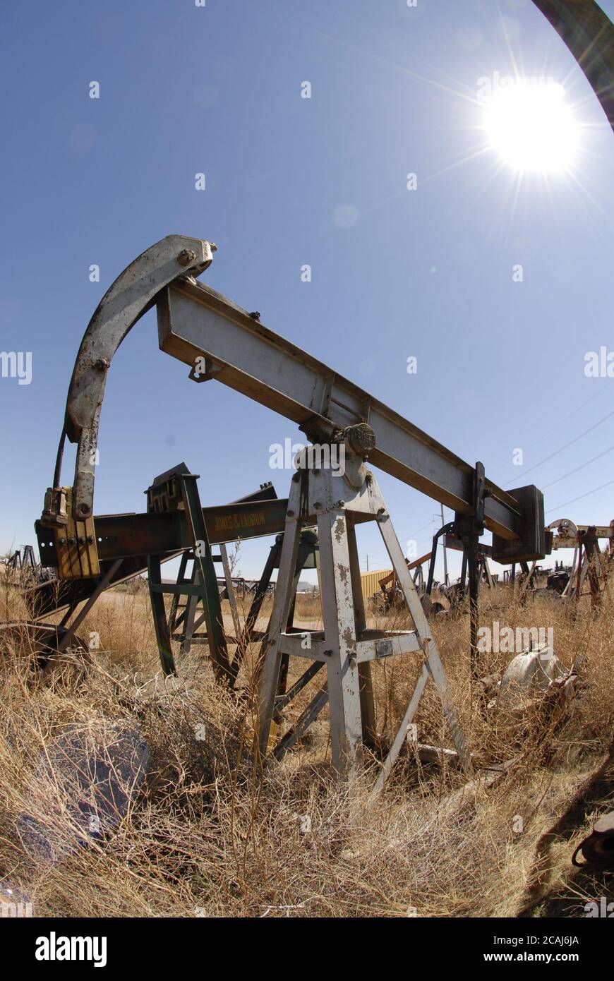 McCamey, Texas USA, March, 2006: Rusting hulks of oil well pumping ...