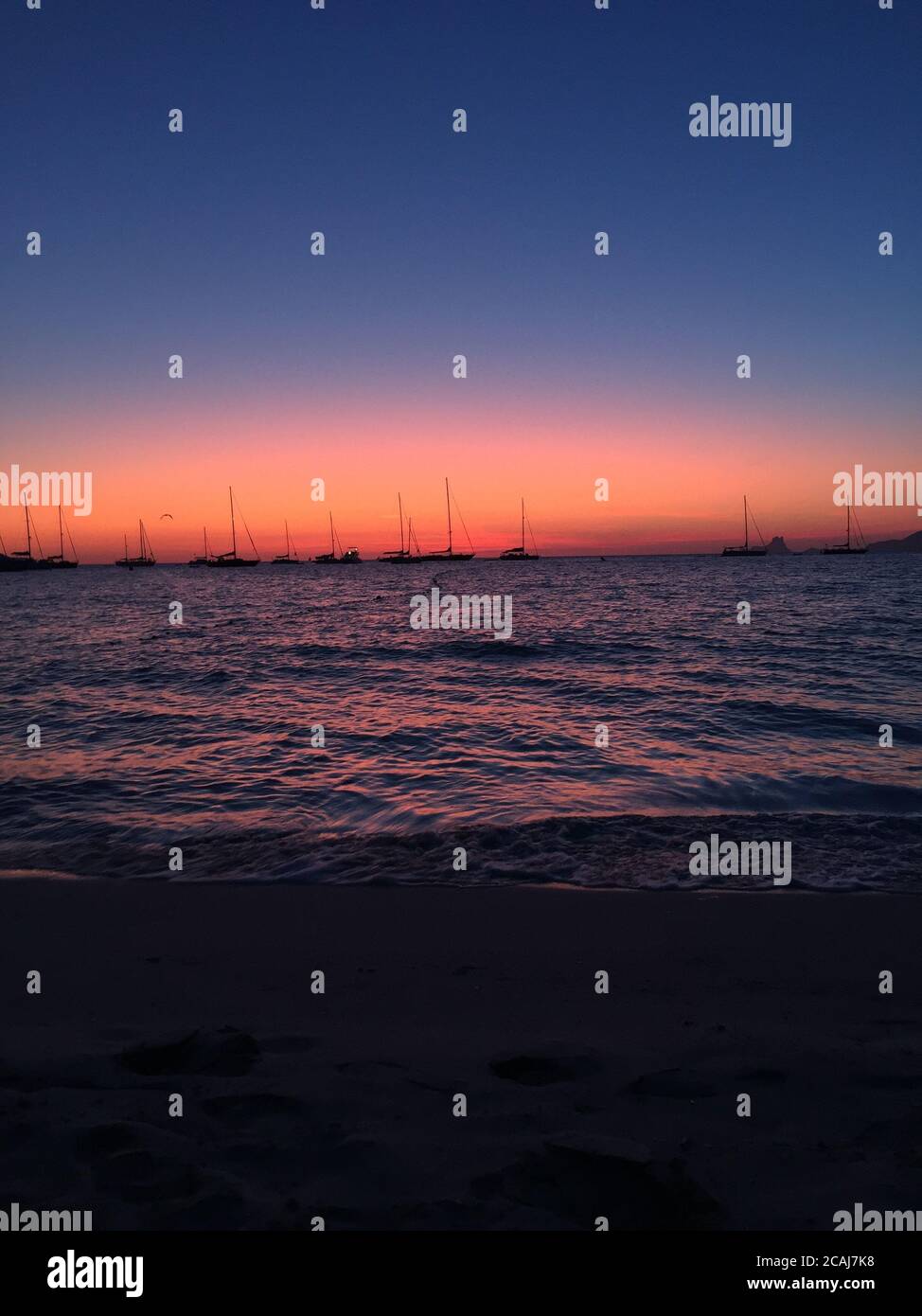Mesmerizing shot of a beautiful sunset over the sea Stock Photo - Alamy