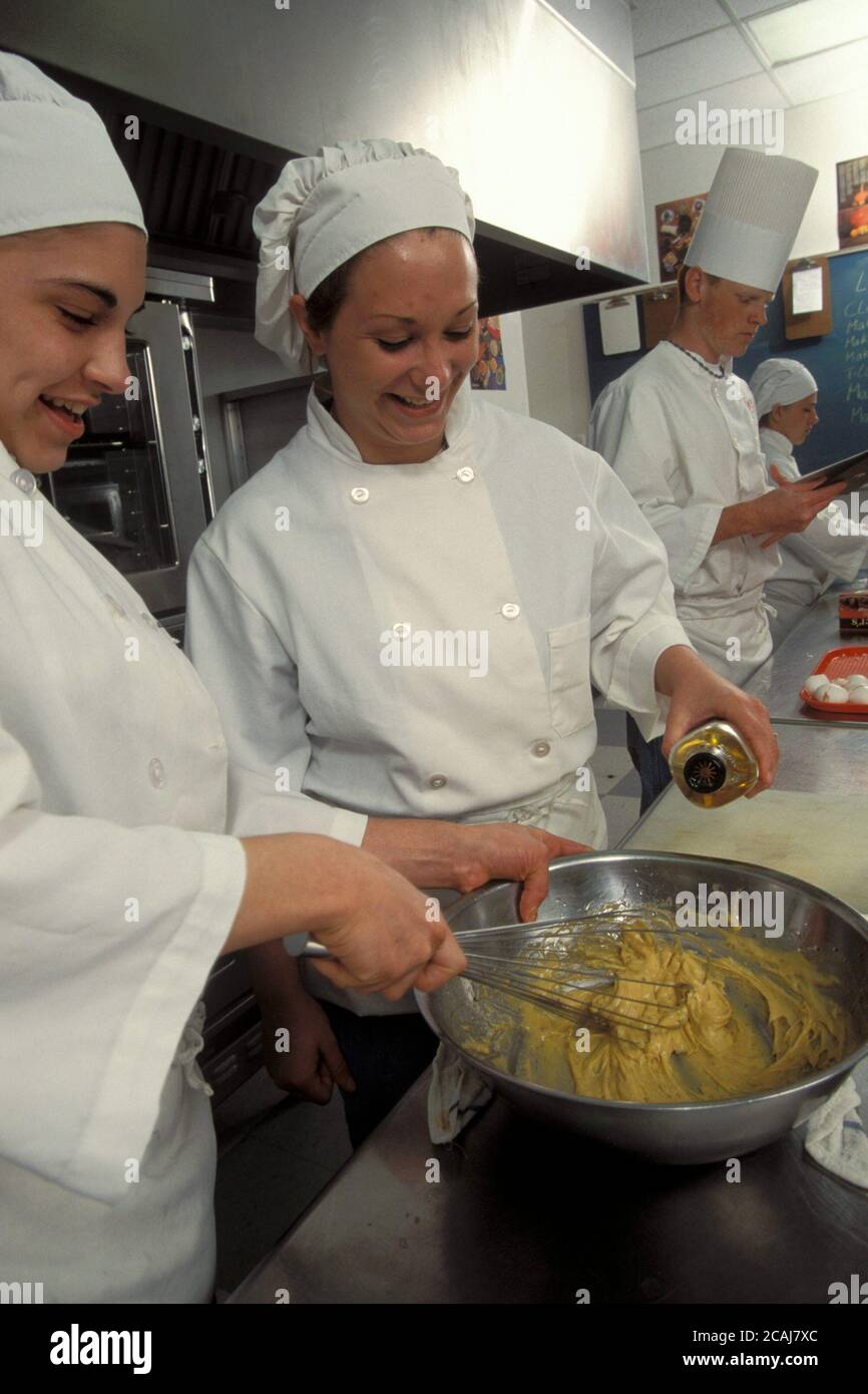 Austin Texas USA: Female and male students wearing chef's berets and ...