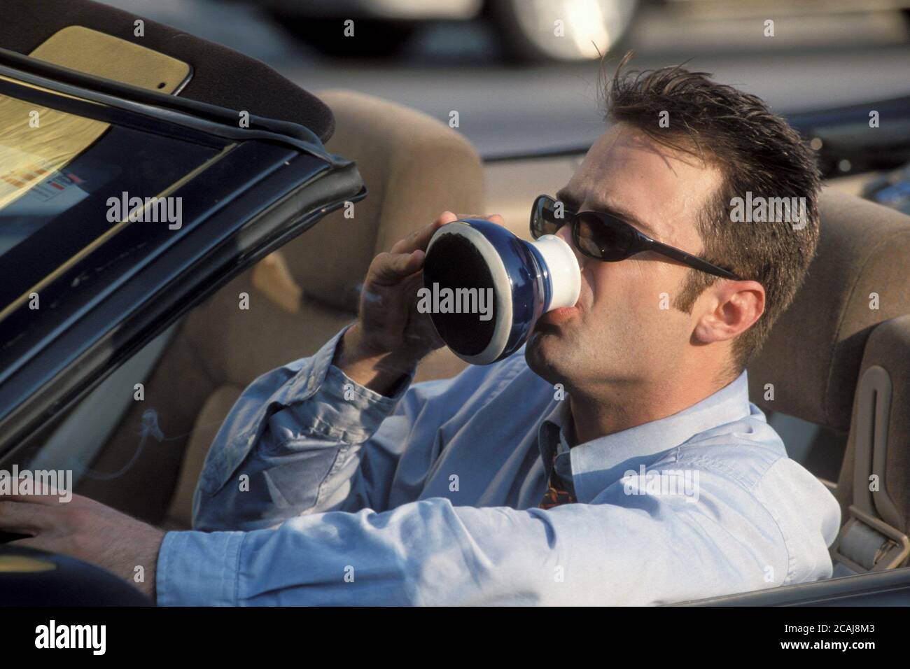 Austin Texas USA: Young Anglo businessman wearing dark glasses and ...